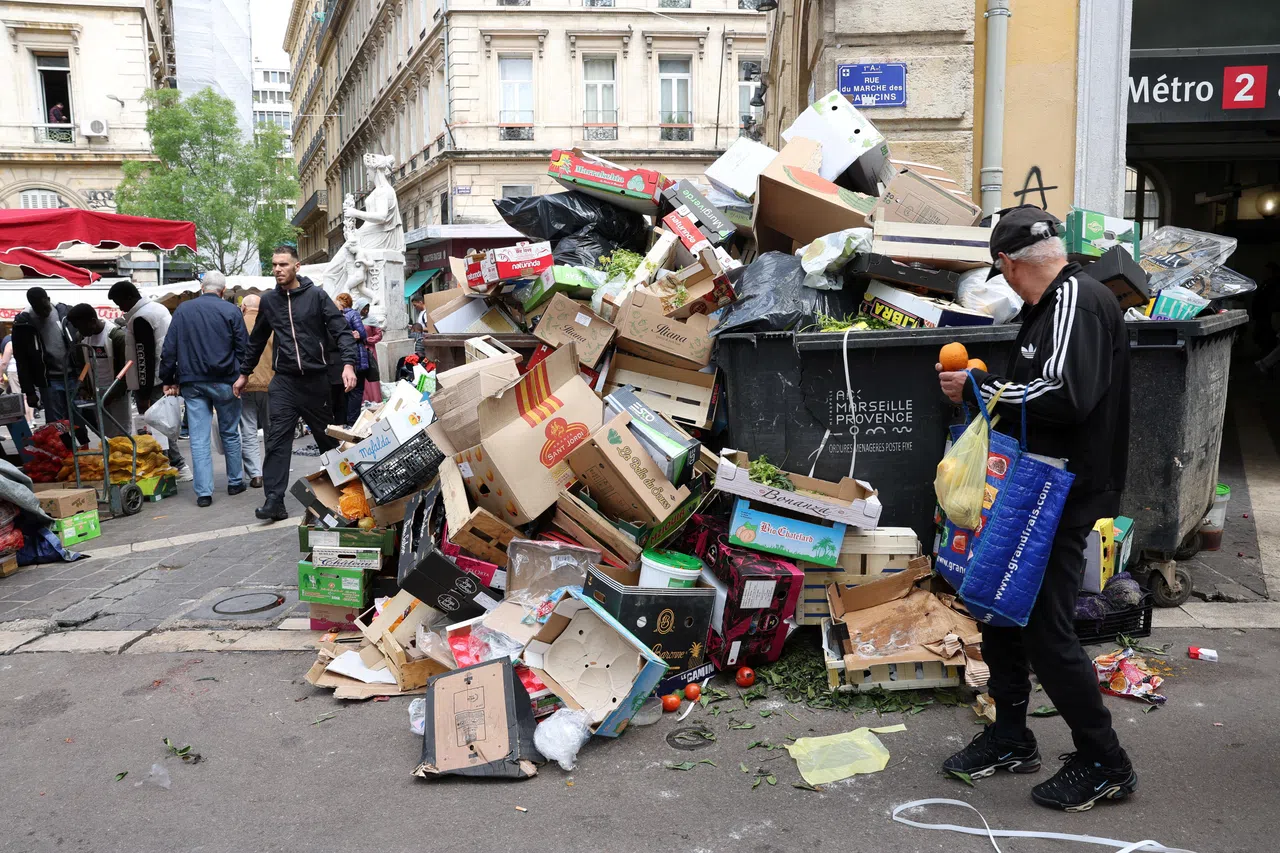 Paris garbage collectors strike months before Olympics - The Business Times
