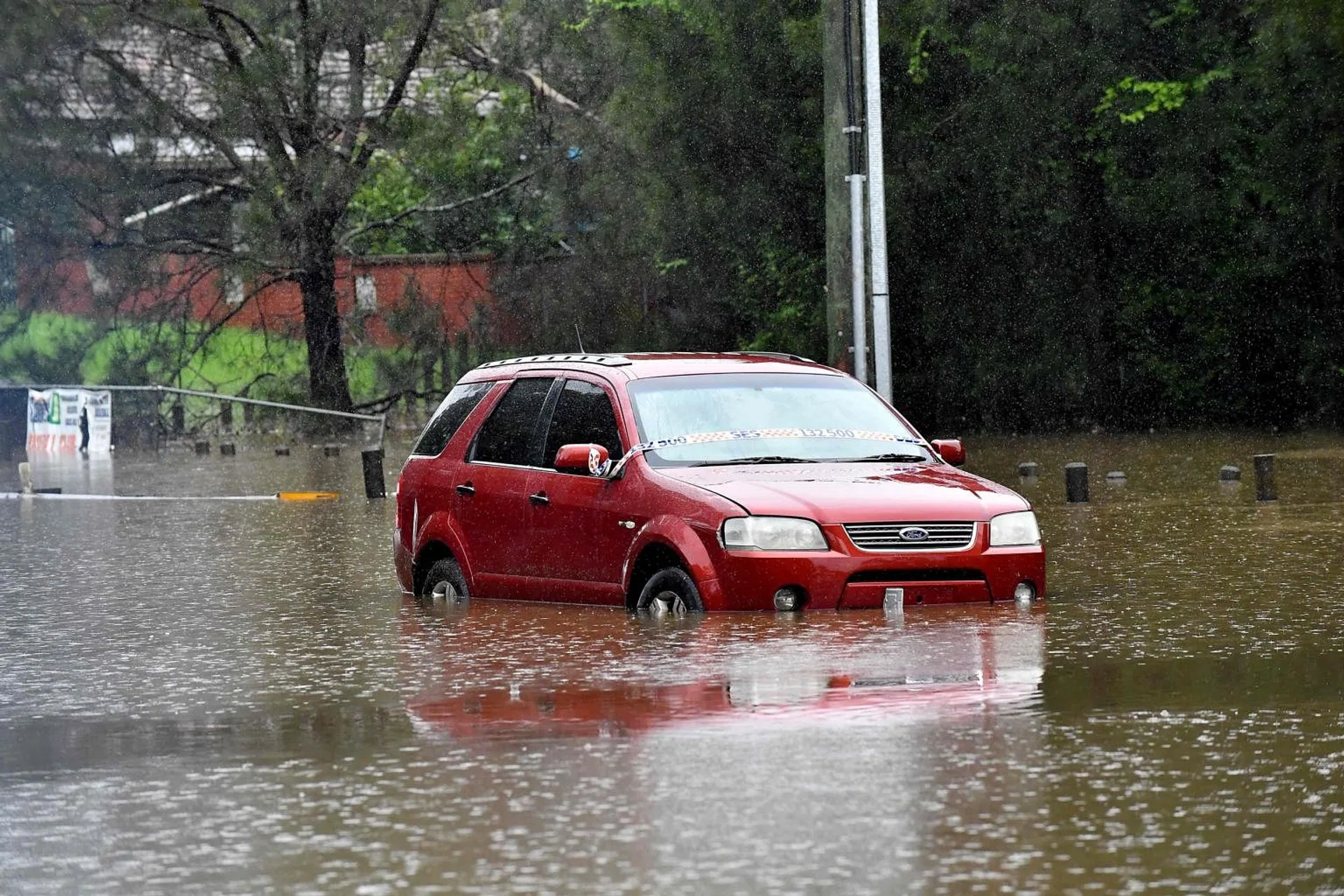 Sydney hit by torrential rains as flood warnings stretch across ...