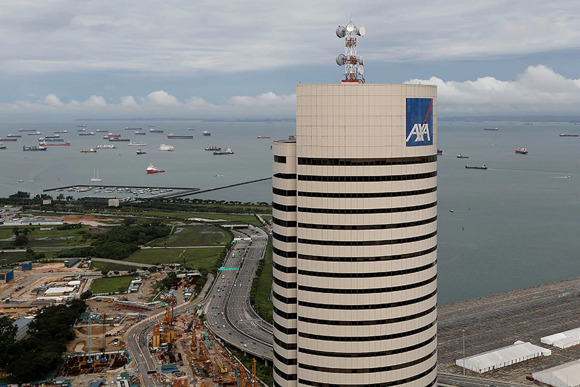 New projects on AXA Tower, PIL Building sites set to yield more office ...