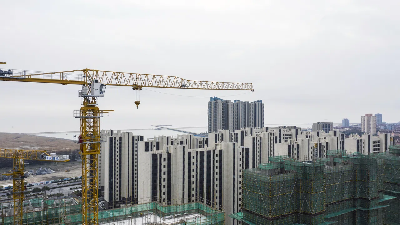 China vows to accelerate buying unsold homes for public housing - The ...