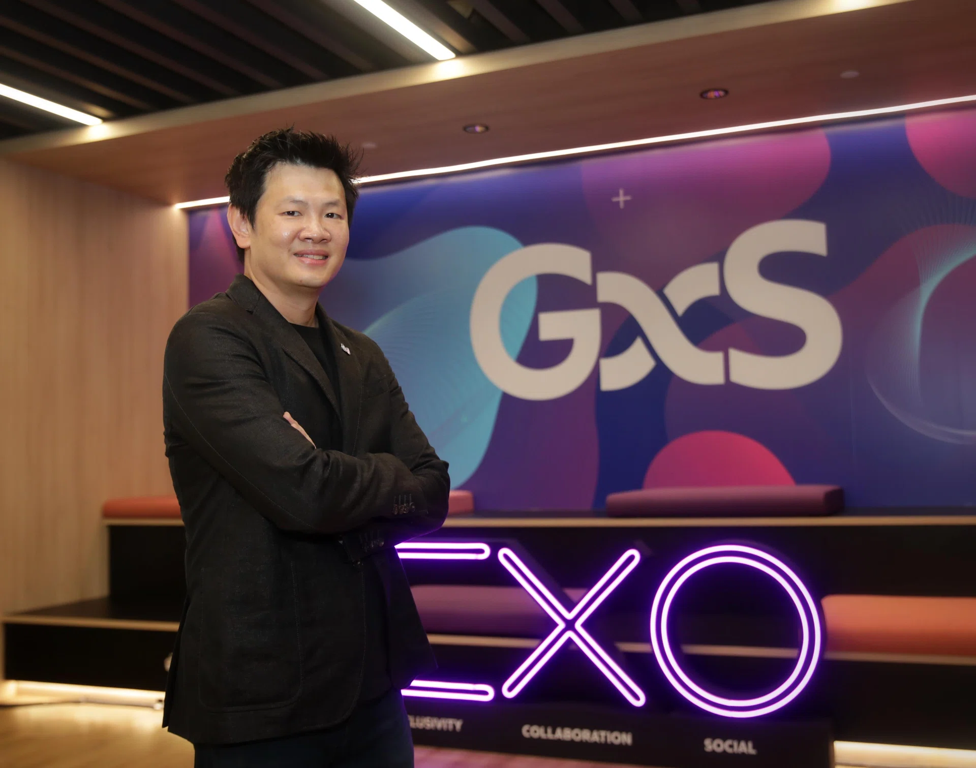 GXS Singapore CEO Charles Wong steps down, remains as an adviser - The ...