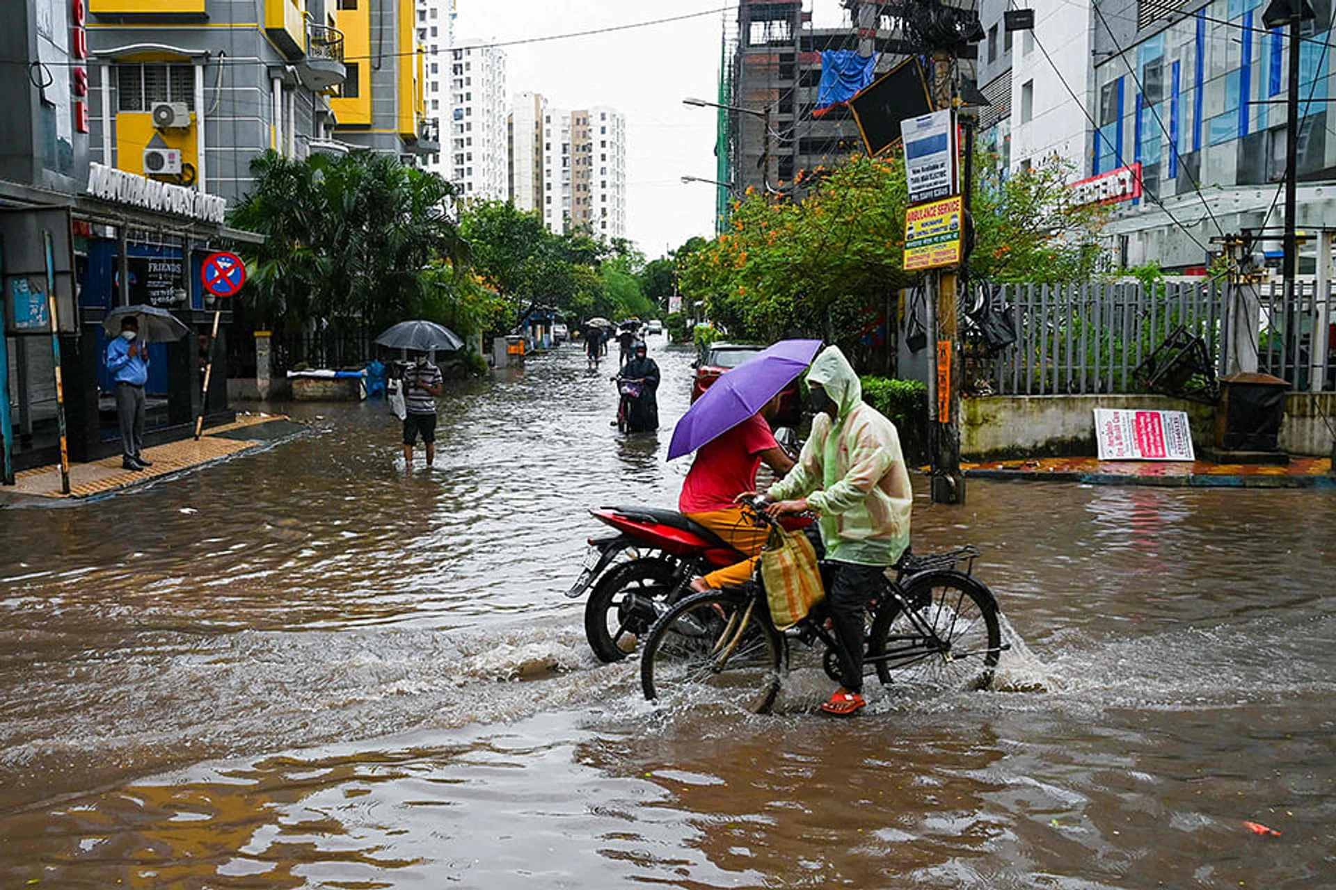 Looming clash between man-made and natural risks - The Business Times
