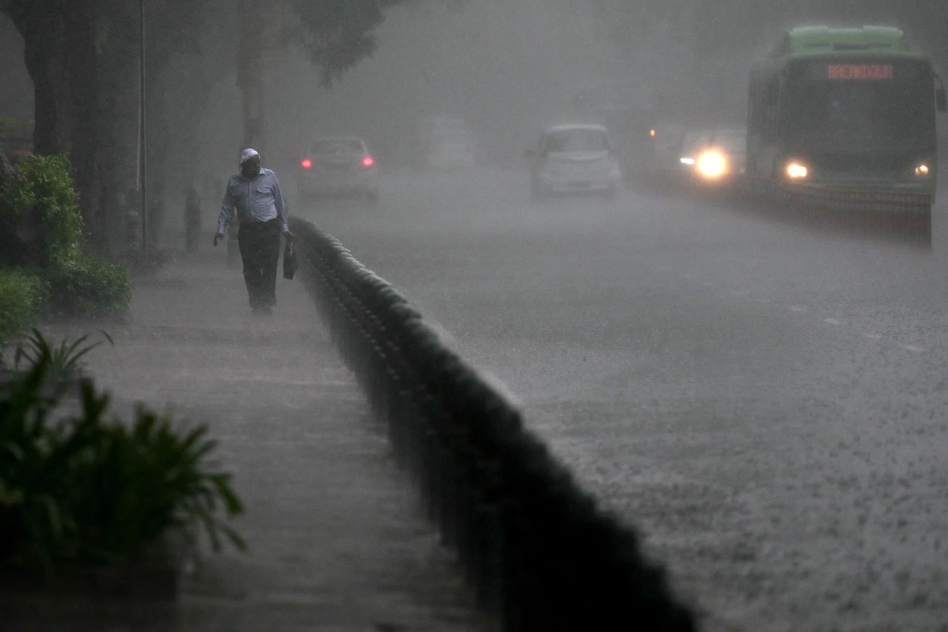 Eleven dead in Indian capital after heavy rain, flight operations ...