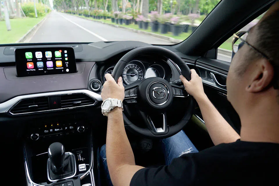 How to use your phone while driving properly - and legally - The ...