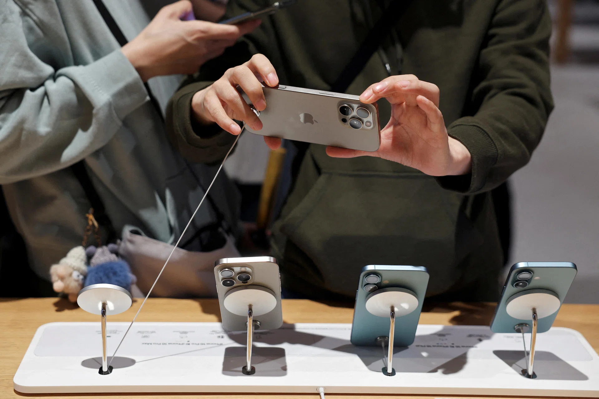 Alibaba’s shares soar after investors buy iPhone AI hopes - The ...