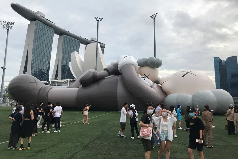 Kaws' giant sculpture reopens to crowds