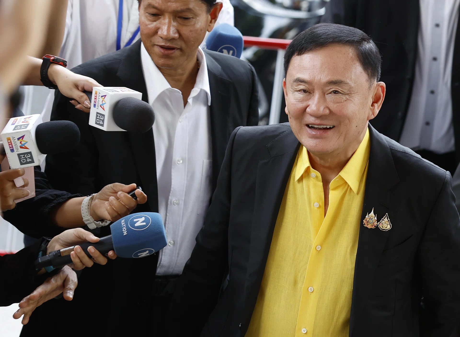 Thaksin faces royal insult charge as Thai court begins trial - The ...