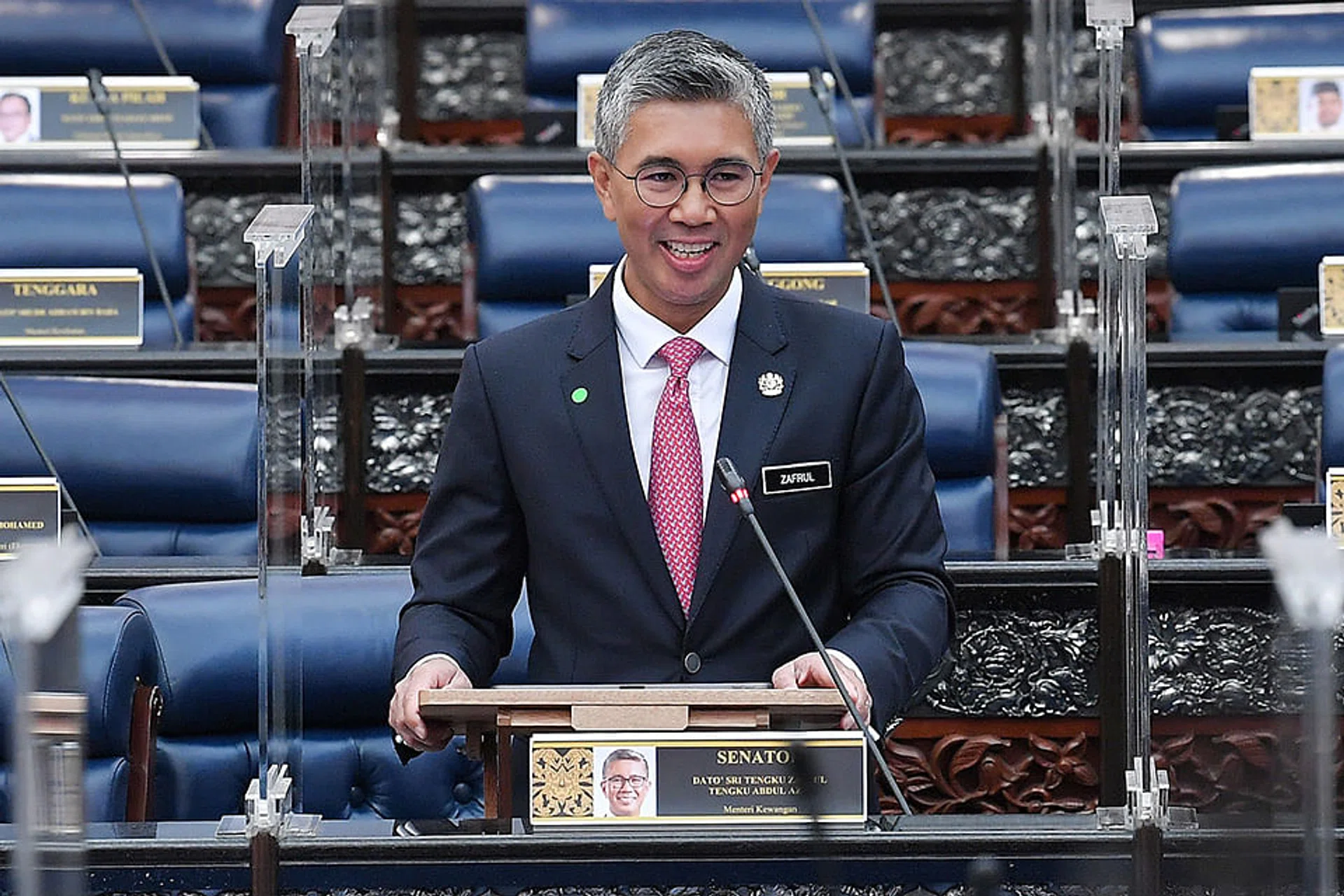 Malaysia's PM Ismail retains finance minister, senior figures in new ...