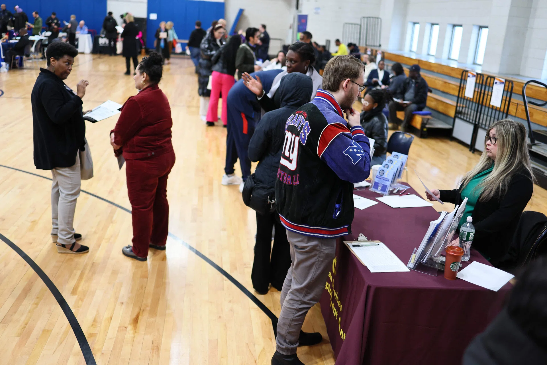 US weekly jobless claims fall more than expected - The Business Times