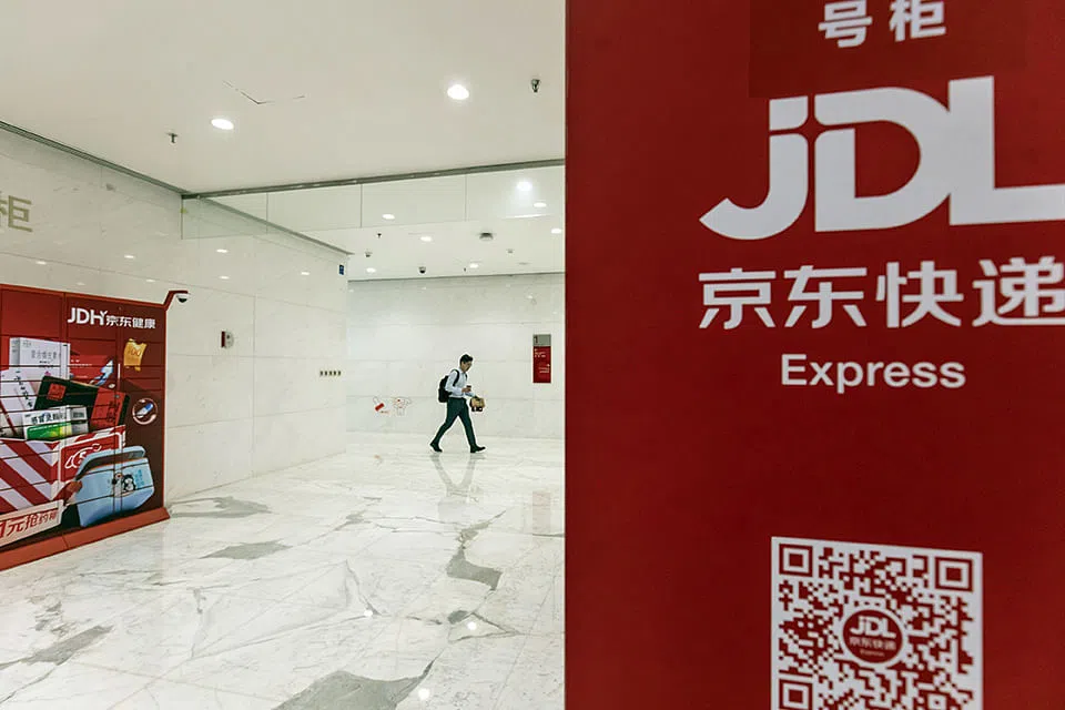 JD Logistics shares lose steam to close 3.3% higher - The Business Times