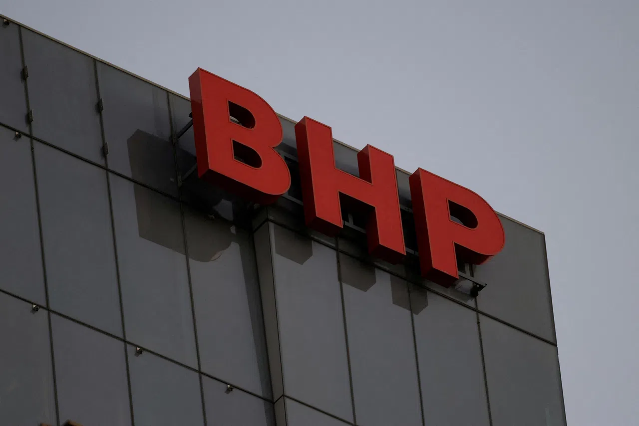 BHP posts smallest annual profit in five years on lower iron ore prices ...