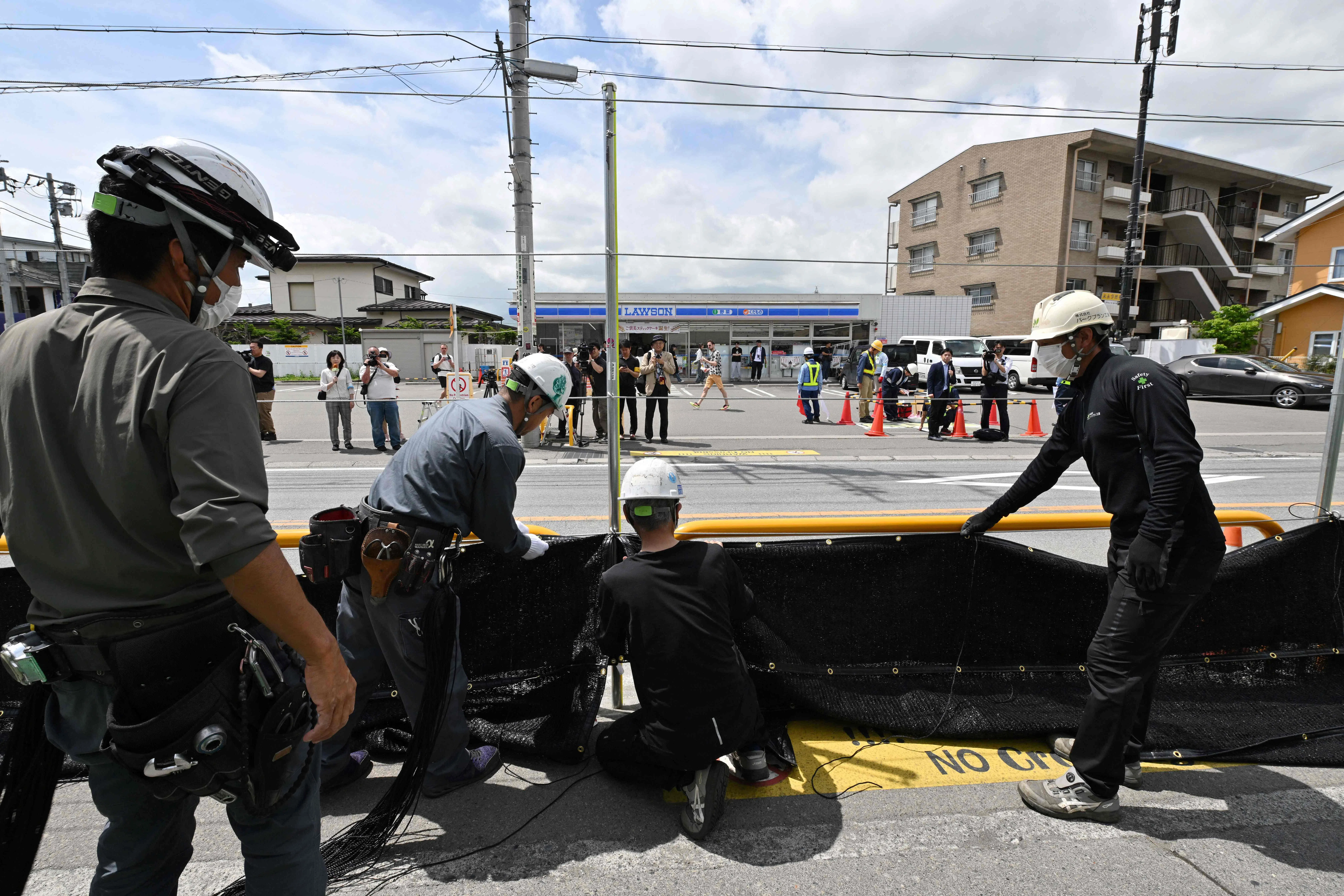Holes poked in Mount Fuji barrier, Japan town says - The Business Times
