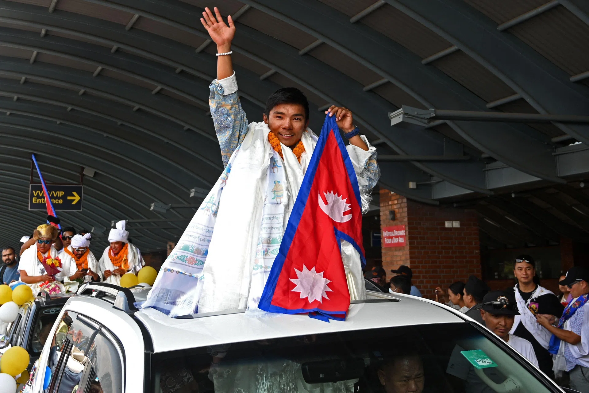 Nepali teenager hailed as hero after climbing world's 8,000m peaks - The Business Times