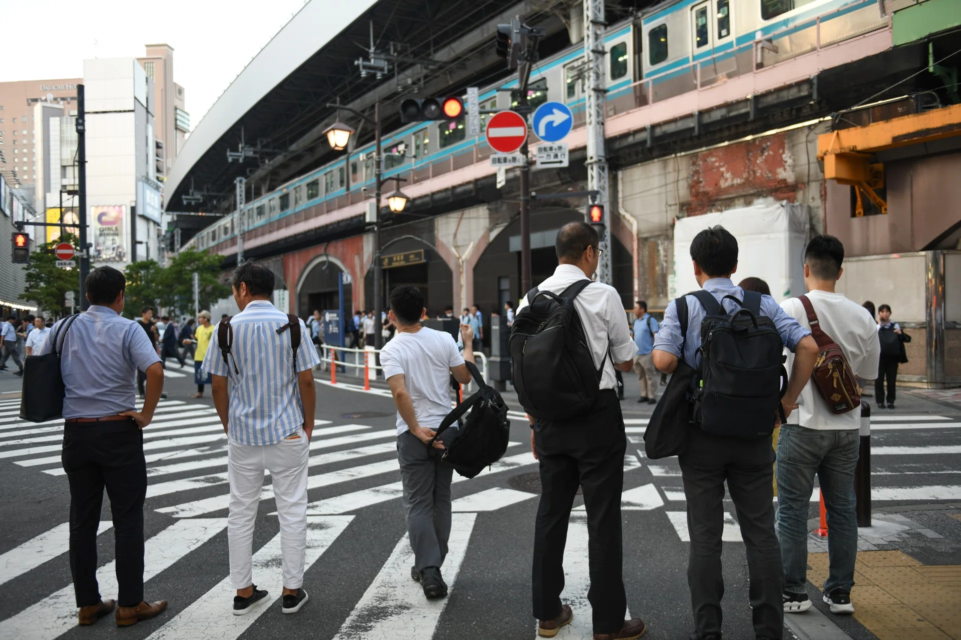 Japan panel urges record minimum pay hike in bright sign for Bank of ...