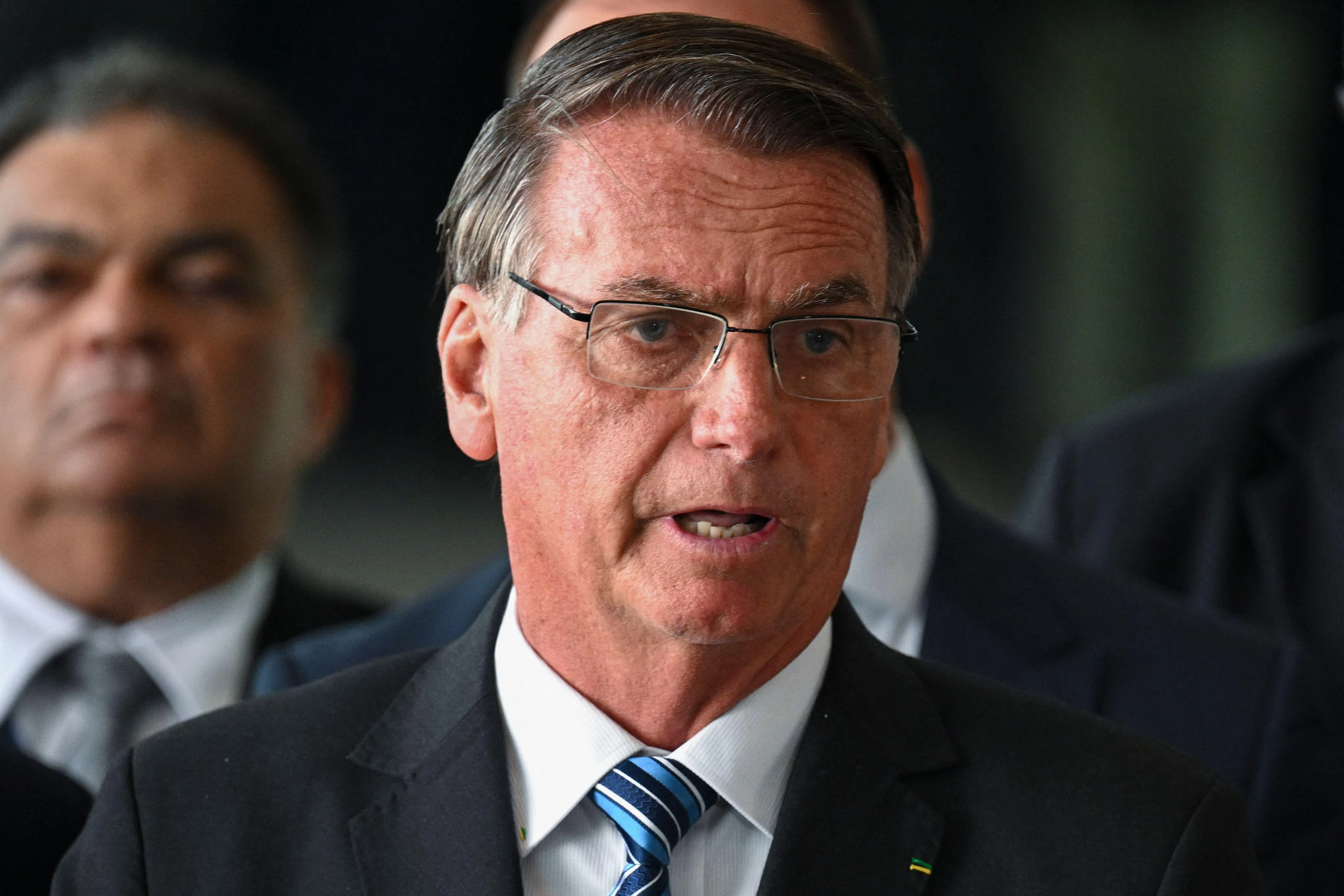 Brazil’s Bolsonaro given 27-year term for coup plotting - The Business ...