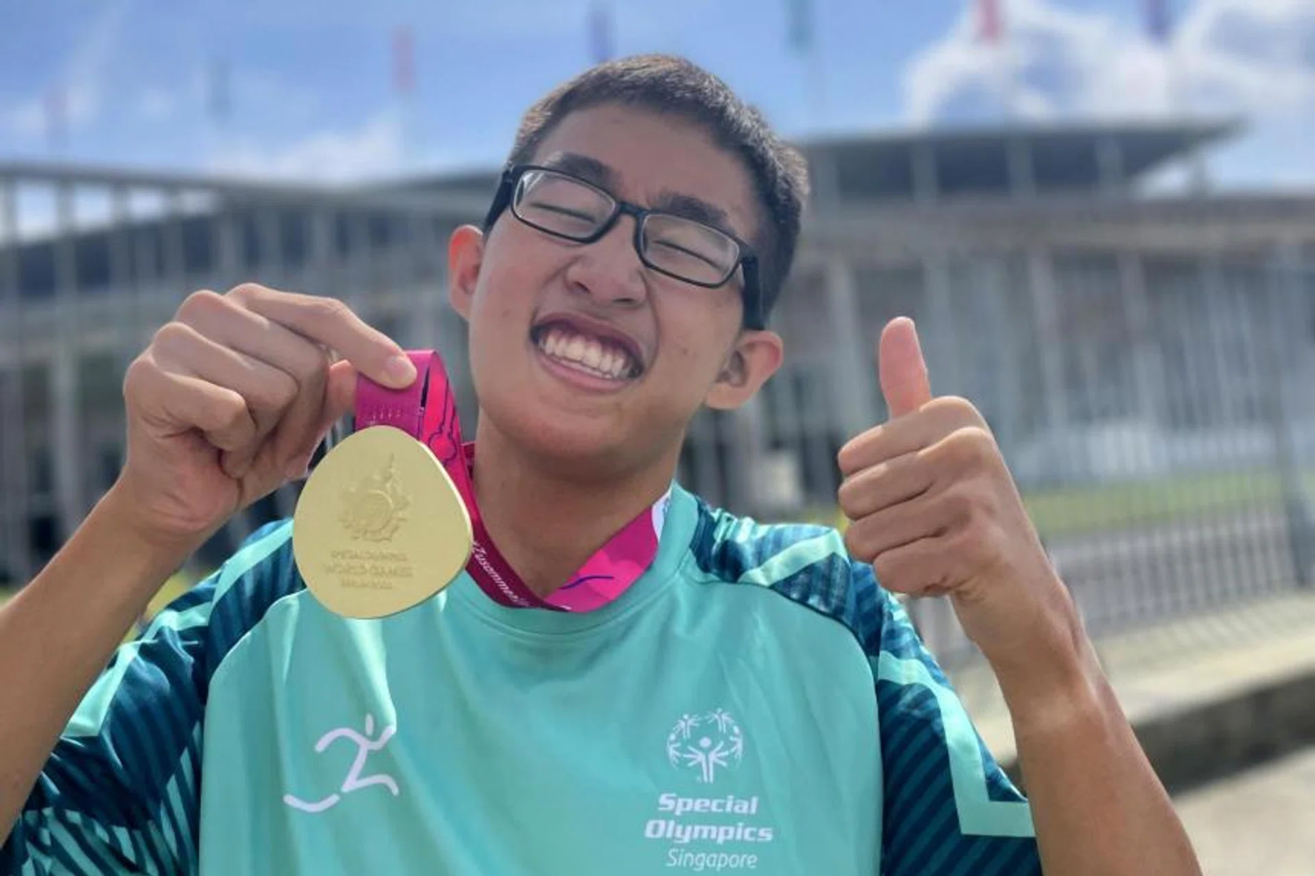 Runner Irving Tan wins Singapore’s first gold at Special Olympics World ...