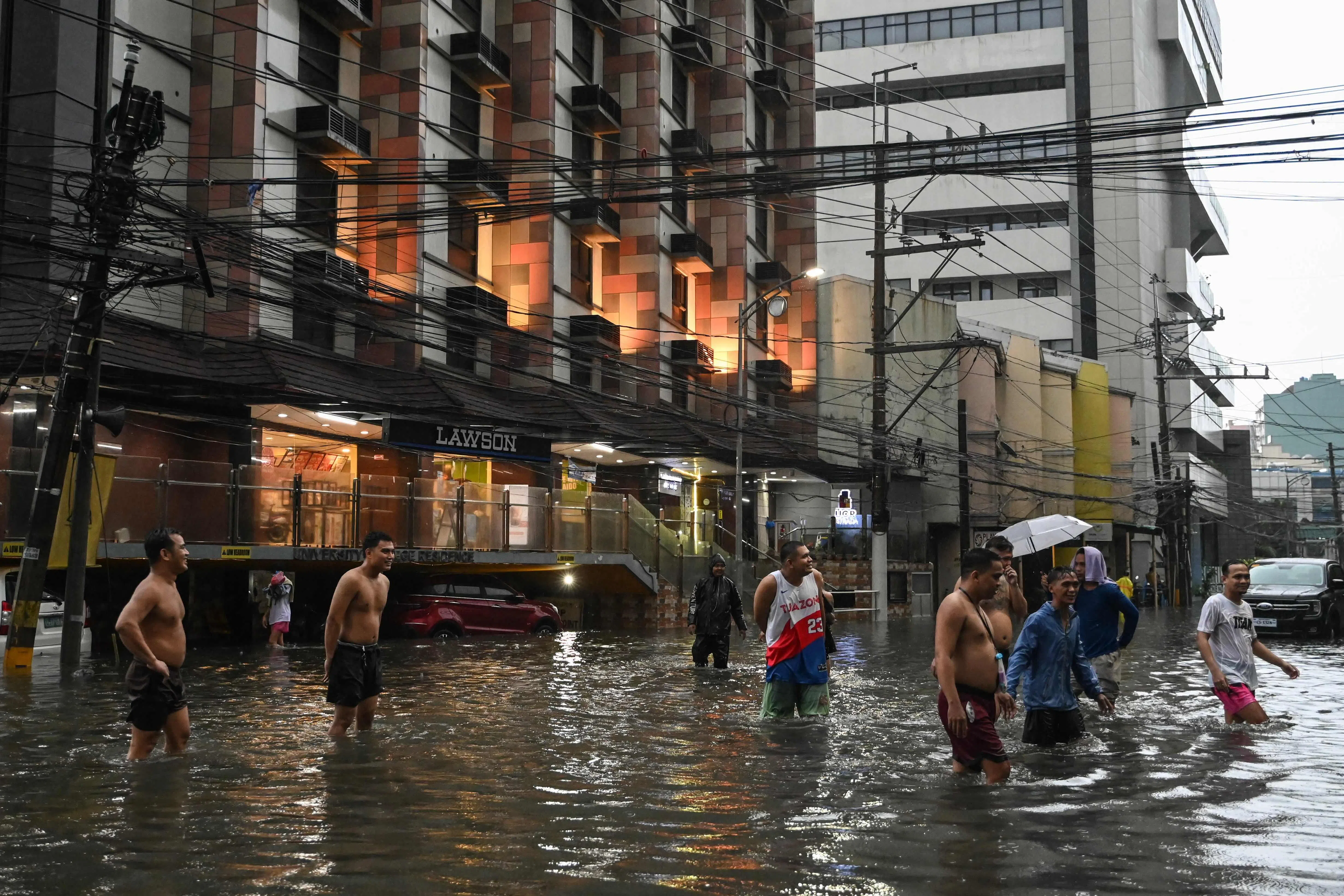 Streets turned into rivers as Typhoon Gaemi hits Philippines - The ...