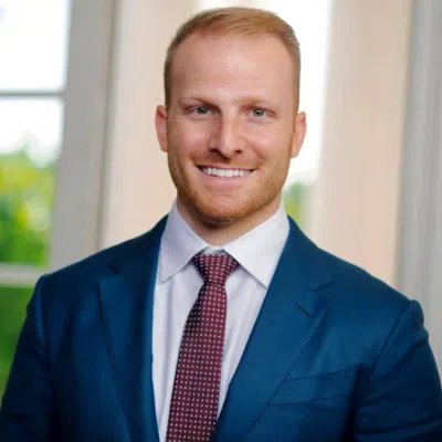 John W Moore - The Business Times