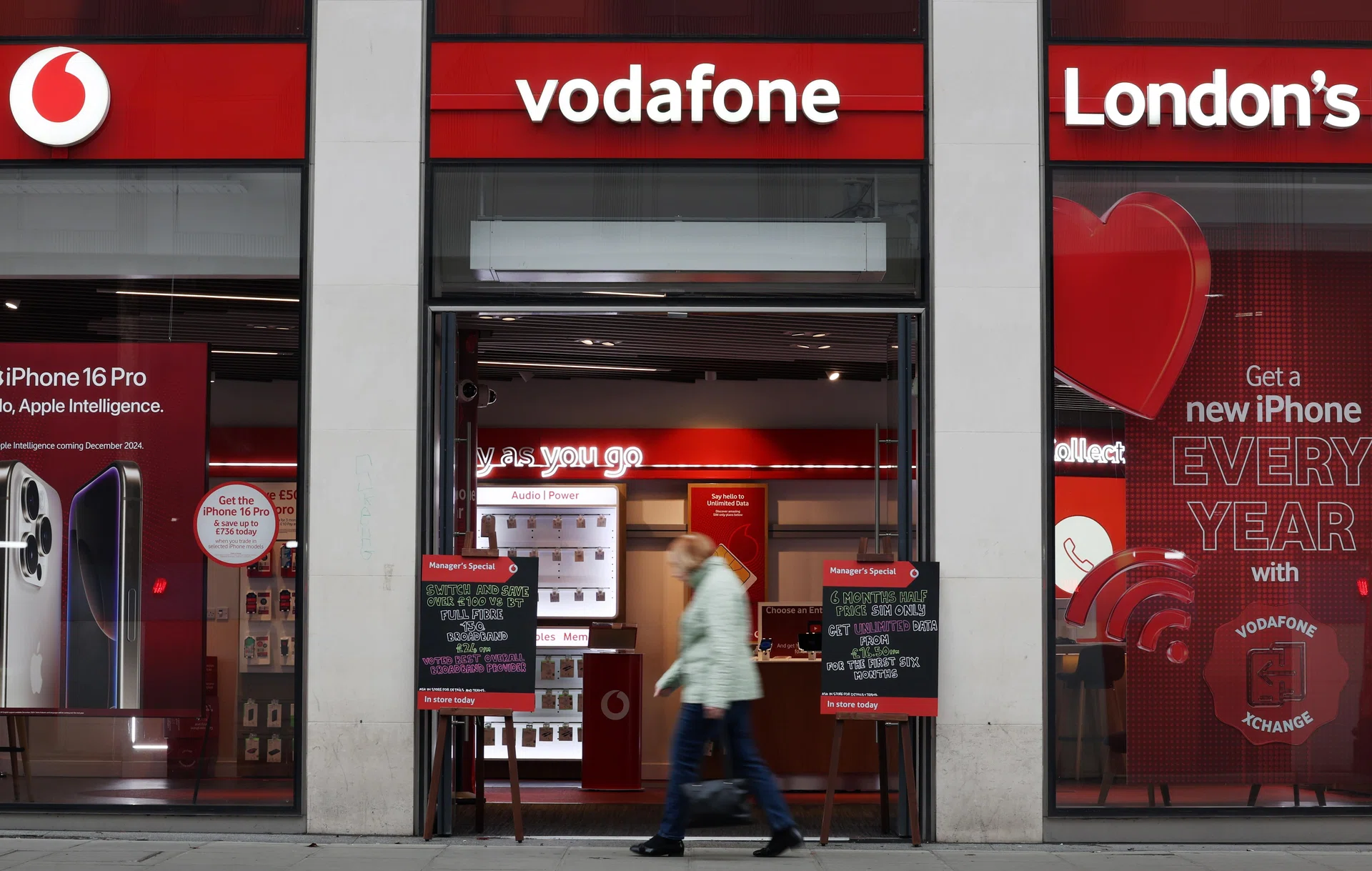 Britain approves US$19 billion Vodafone-Three mobile merger - The ...