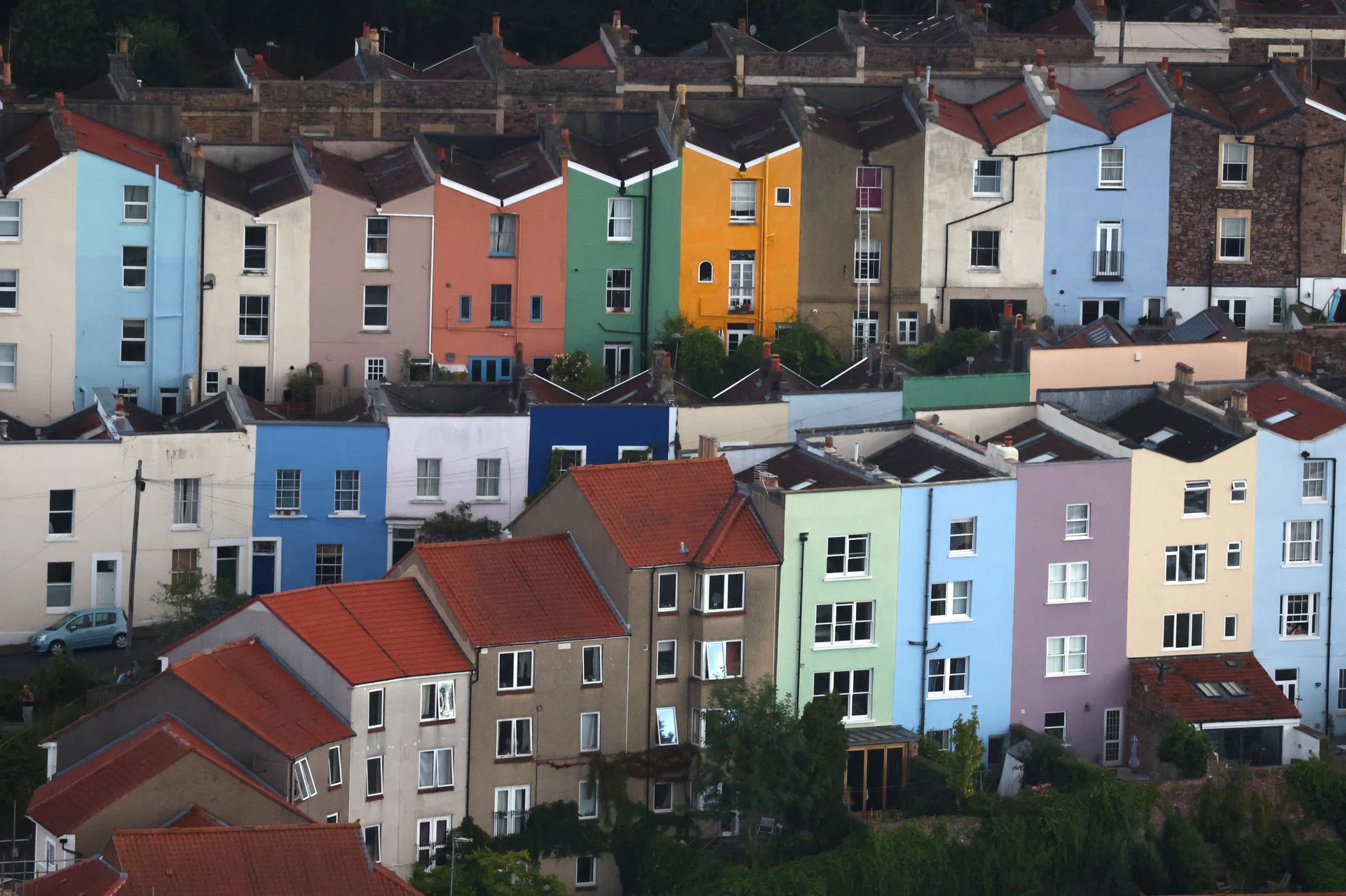 UK house prices hit record high but rise by least in 3 months: Halifax ...