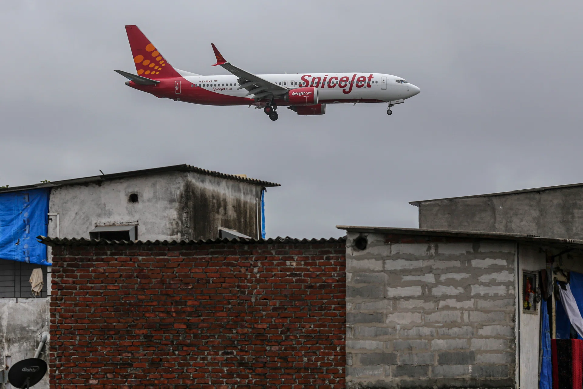 SpiceJet posts fourth-quarter profit on loan settlement gains - The ...
