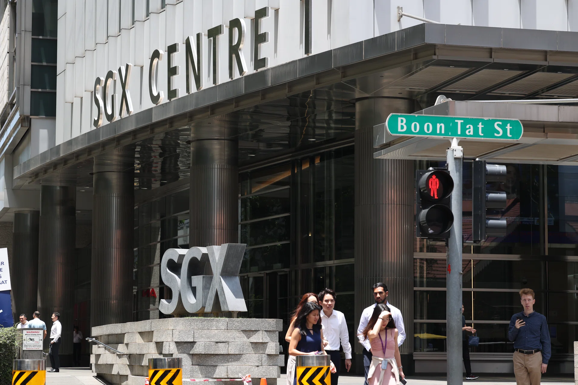 Education of investors, not excessive regulations, to revive SGX - The Business Times