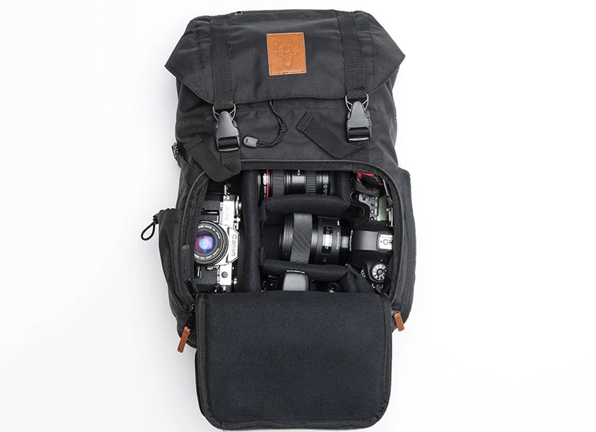 Gear this week: A Swatch mechanical watch, a handsome camera backpack ...