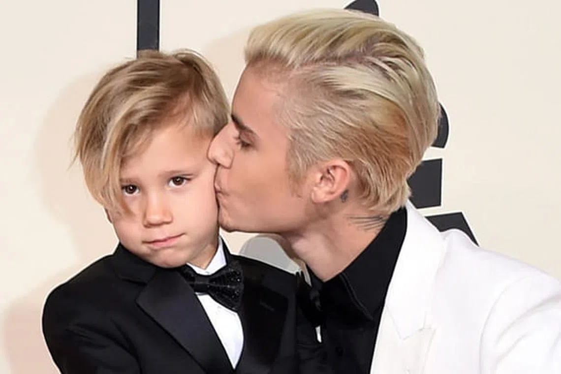 Justin Bieber Teaches His Little Bro Jaxon How To Pose On The Red Carpet - Harper's Bazaar ...