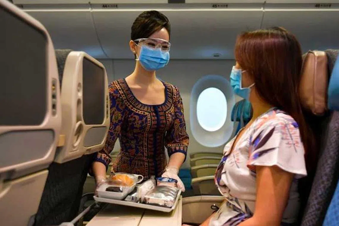 What flying with SIA will be like in the Covid-19 era - Her World ...