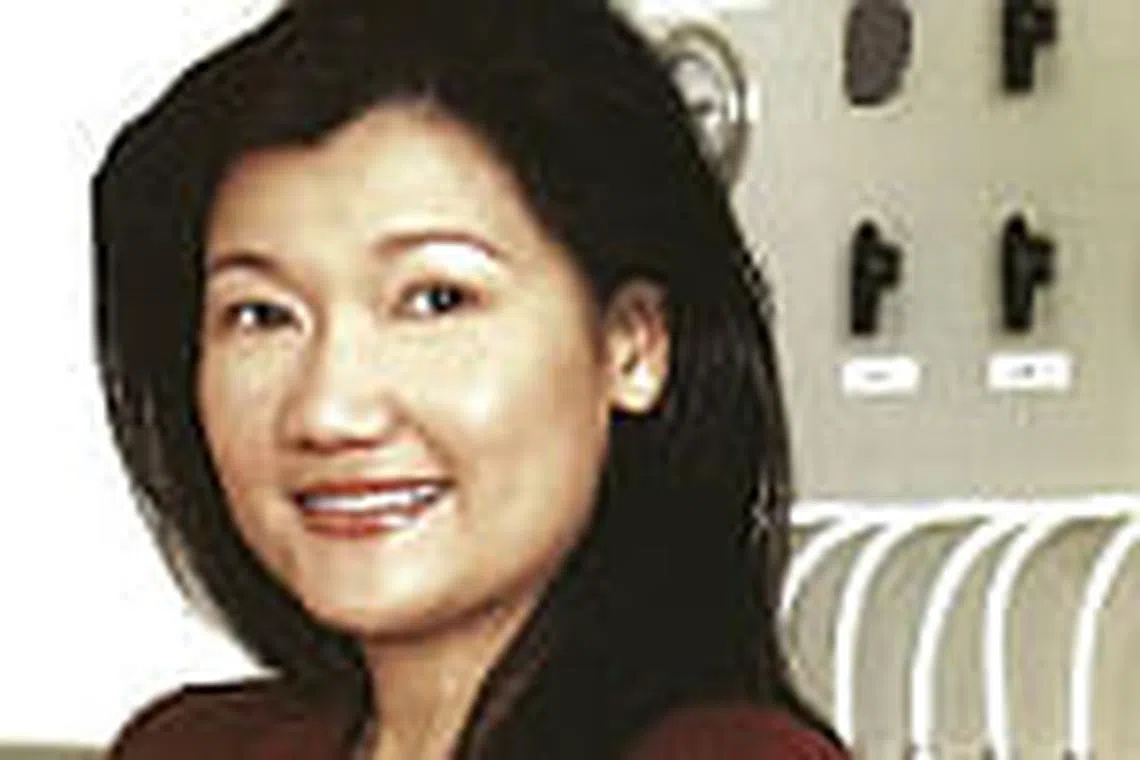 Her World Woman of the Year 2002: Olivia Lum - Her World Singapore ...