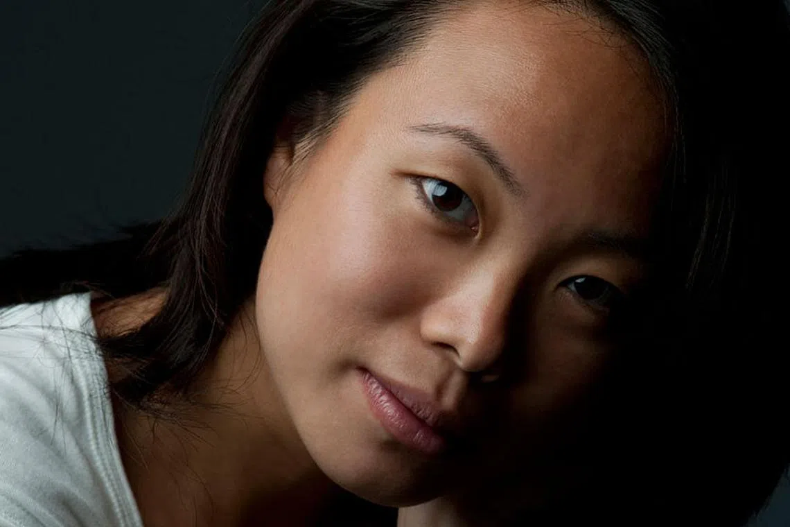 Her World Young Woman Achiever Sim Chi Yin creates nuclear exhibition ...