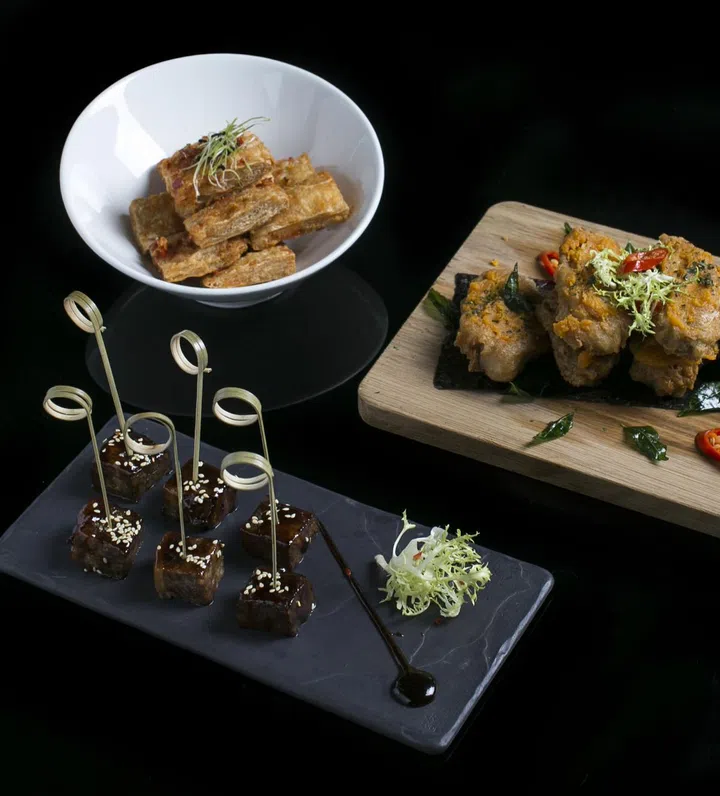 Raise a toast to the best bar bites to line your tummy with in ...