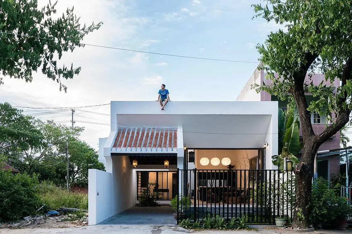 All-white landed house with minimalist courtyards in Vietnam | Home ...