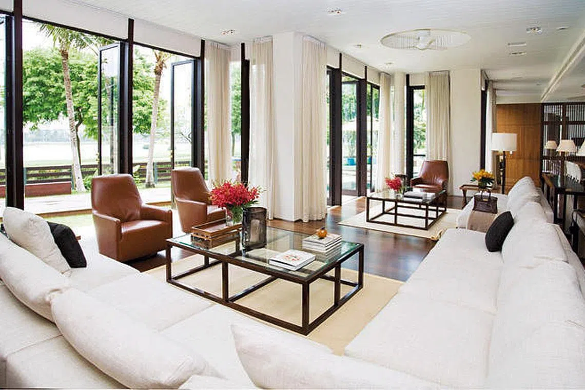 Laid-back and spacious interiors in this Sentosa Cove bungalow | Home ...