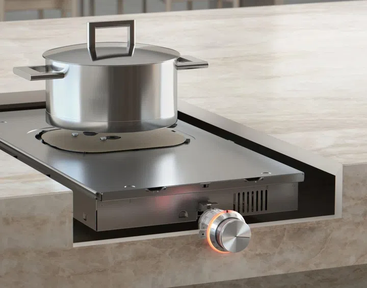 Luxury meets innovation: Induction cooktop vanishes into countertop ...