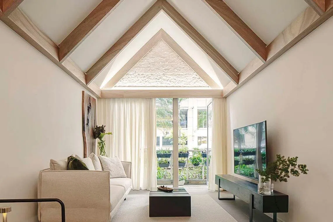 House Tour: Lofty pitched ceilings and distinct zones make this condo ...