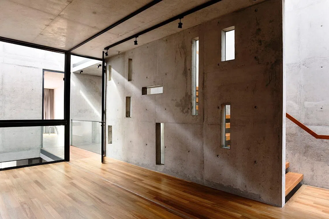 House Tour: This intermediate terrace house has a good mix of concrete ...