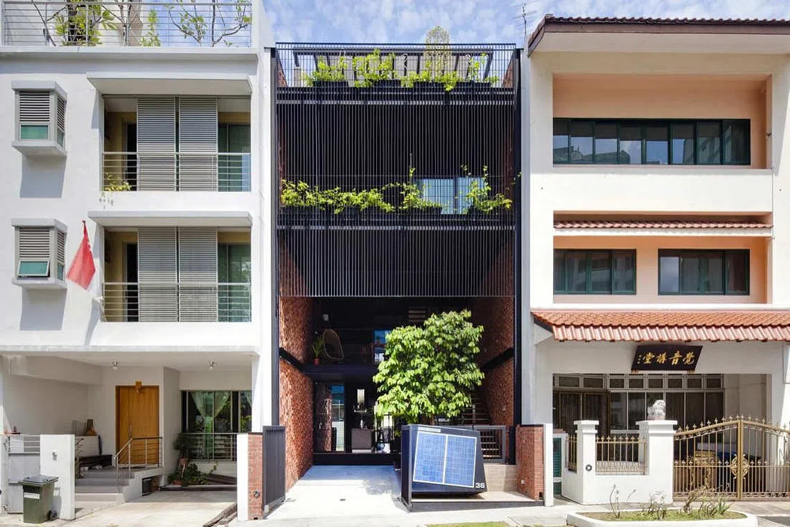 3-storey intermediate terrace house designed for tropical climate ...