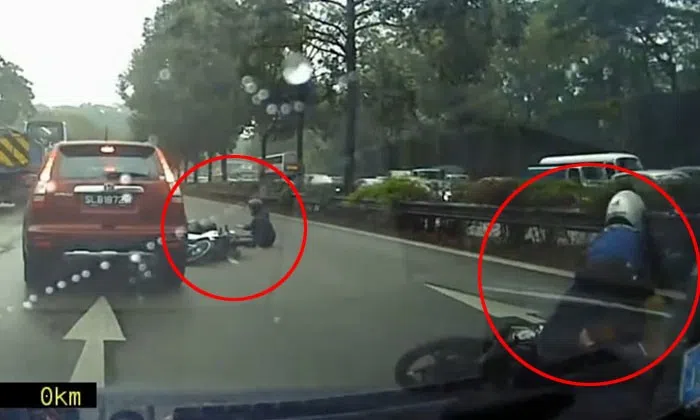 Not 1 but 2 motorcyclists skid and fall on busy road during peak hour ...