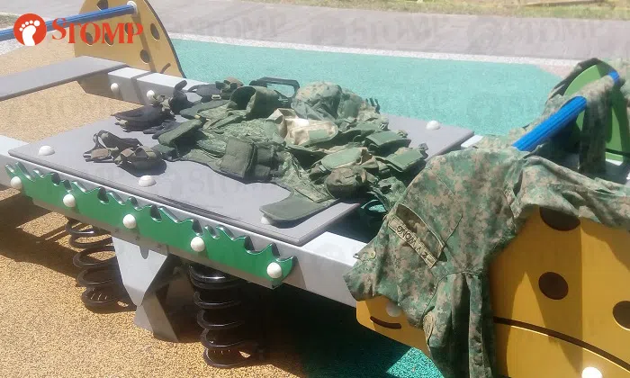 Kids can't play at playground because someone left his army gear there ...