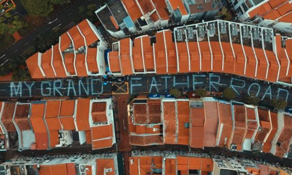 Sticker Lady writes "My Grandfather Road" across Circular Road | STOMP