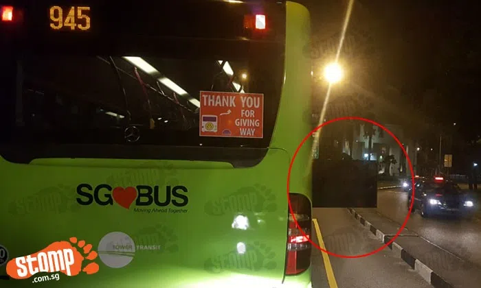 Bus 945 travels with petrol box open, almost hitting motorcyclist's ...