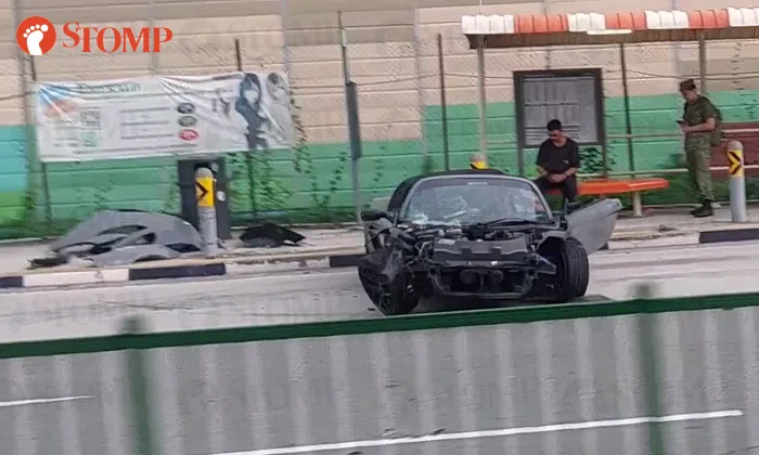 19-year-old driver crashes convertible near bus stop outside Temasek ...