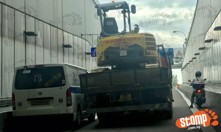 Traffic jam after lorry carrying crane breaks down at one-lane exit ...