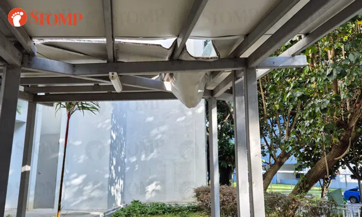 Man found dead after falling through roof of sheltered walkway at ...