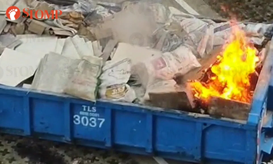 Skip bin catches fire at Yishun block | STOMP
