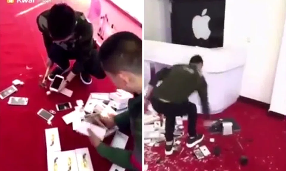 Man buys all the iPhones in store and smashes them because of bad ...