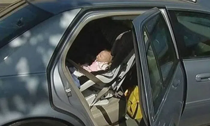 US cop breaks into car to rescue baby trapped inside -- only to ...