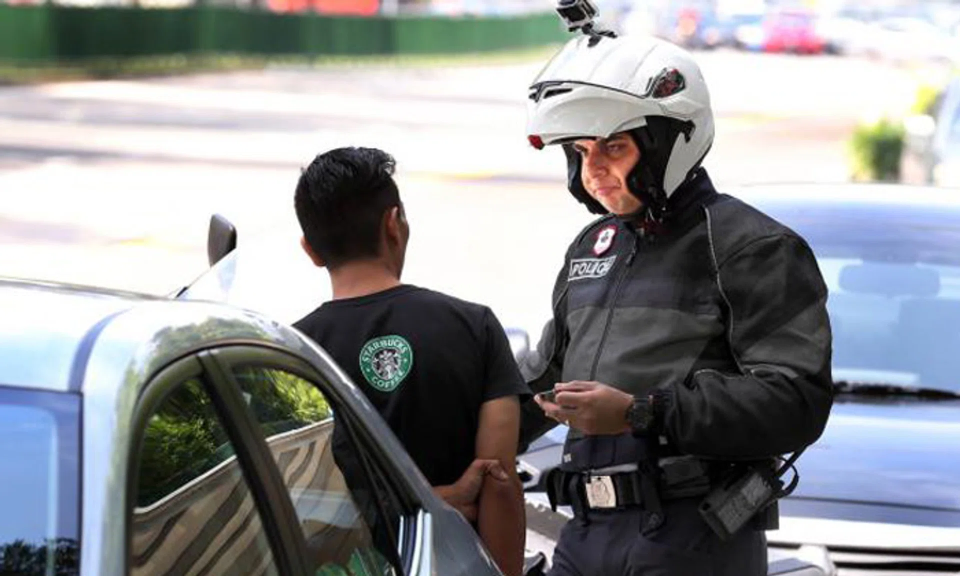 'Men in black bikers' stop errant motorists -- and catch them by ...