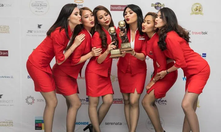AirAsia, Firefly stewardesses' uniforms deemed too sexy by Malaysian ...